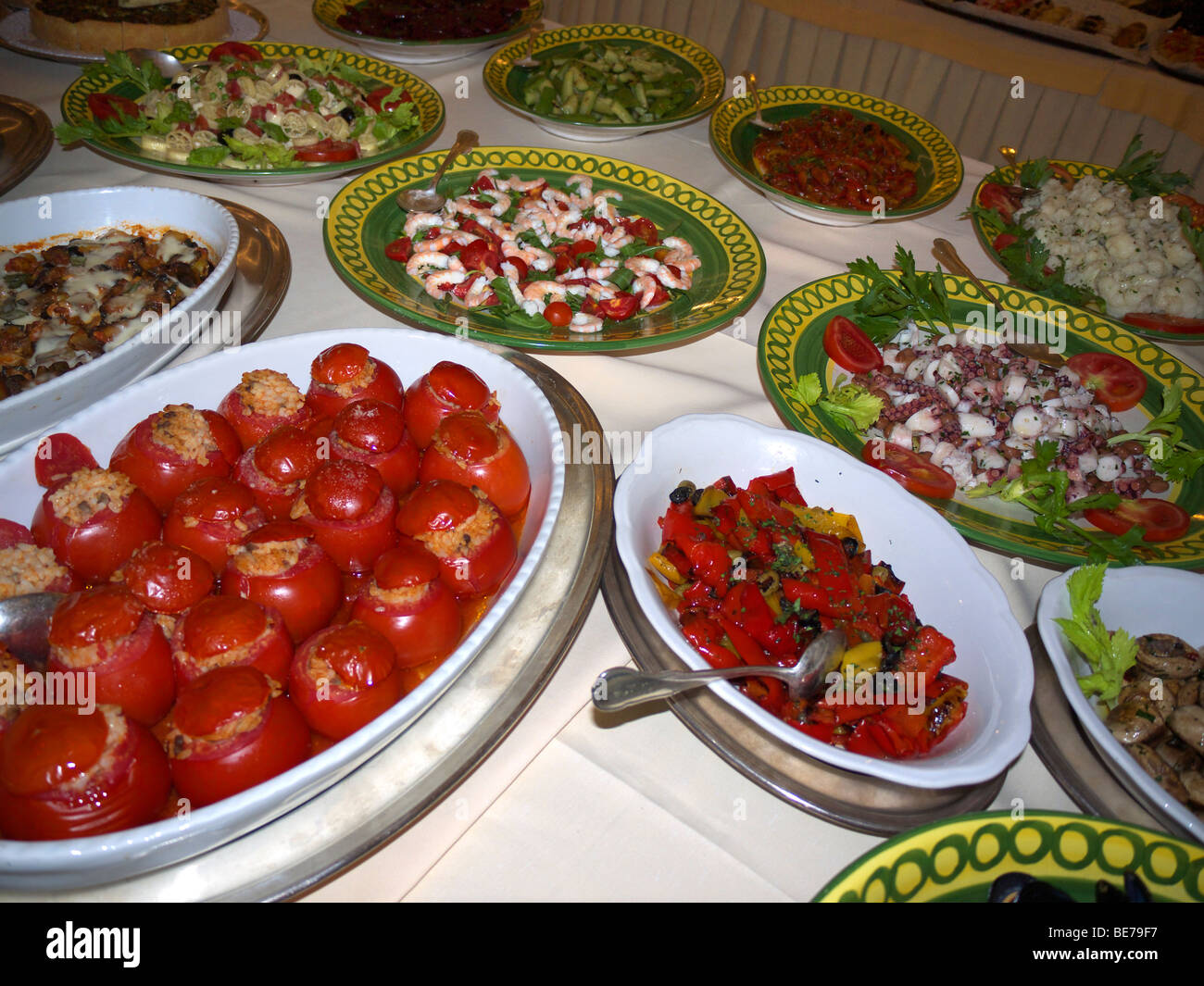 Buffet food with typical Italian dishes and food displayed on Italian ...