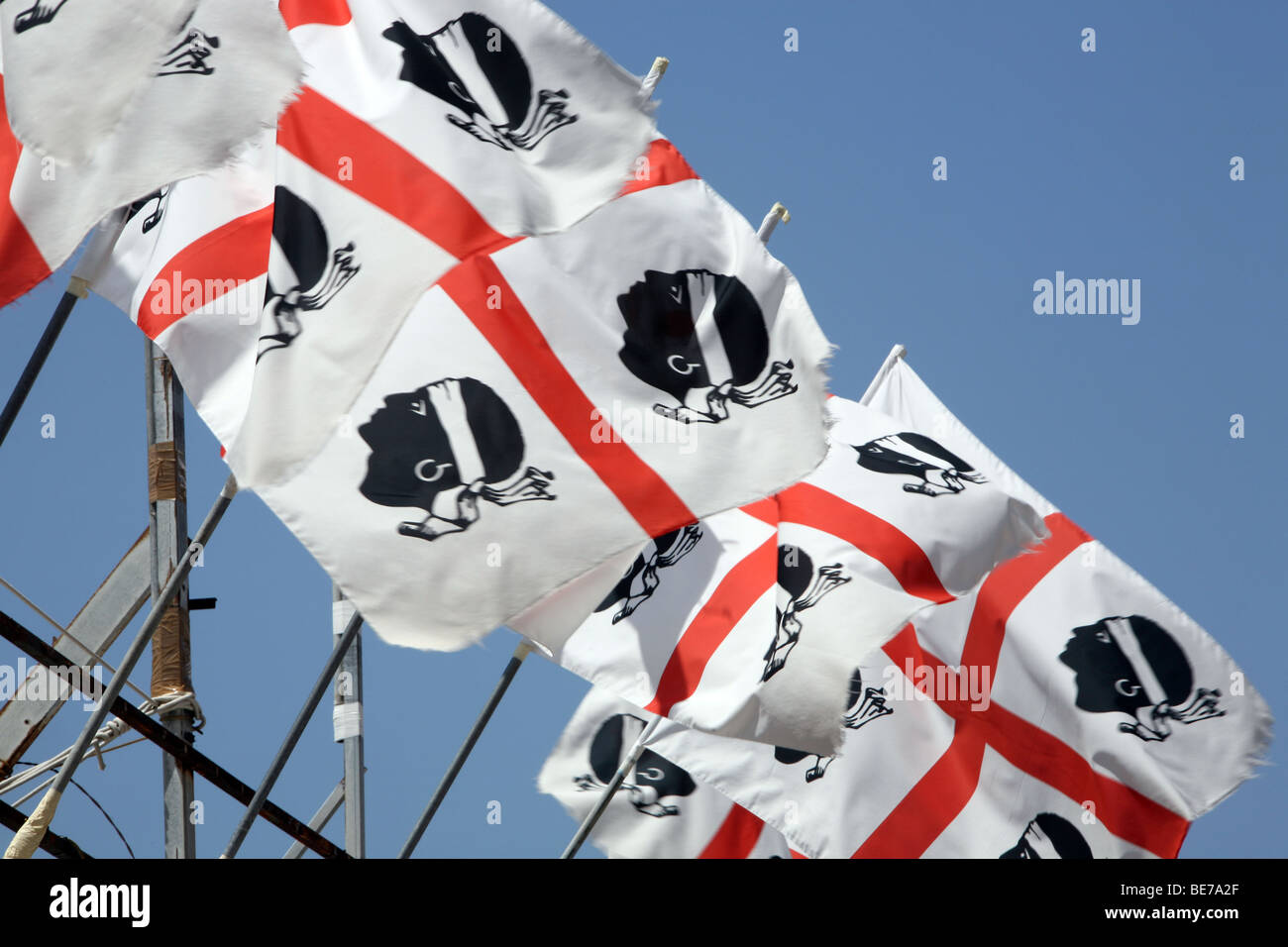 Sardinian flags flying in Castelsardo Sardinia Stock Photo - Alamy
