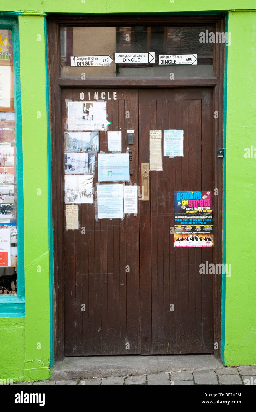 Notices on shop door Stock Photo - Alamy