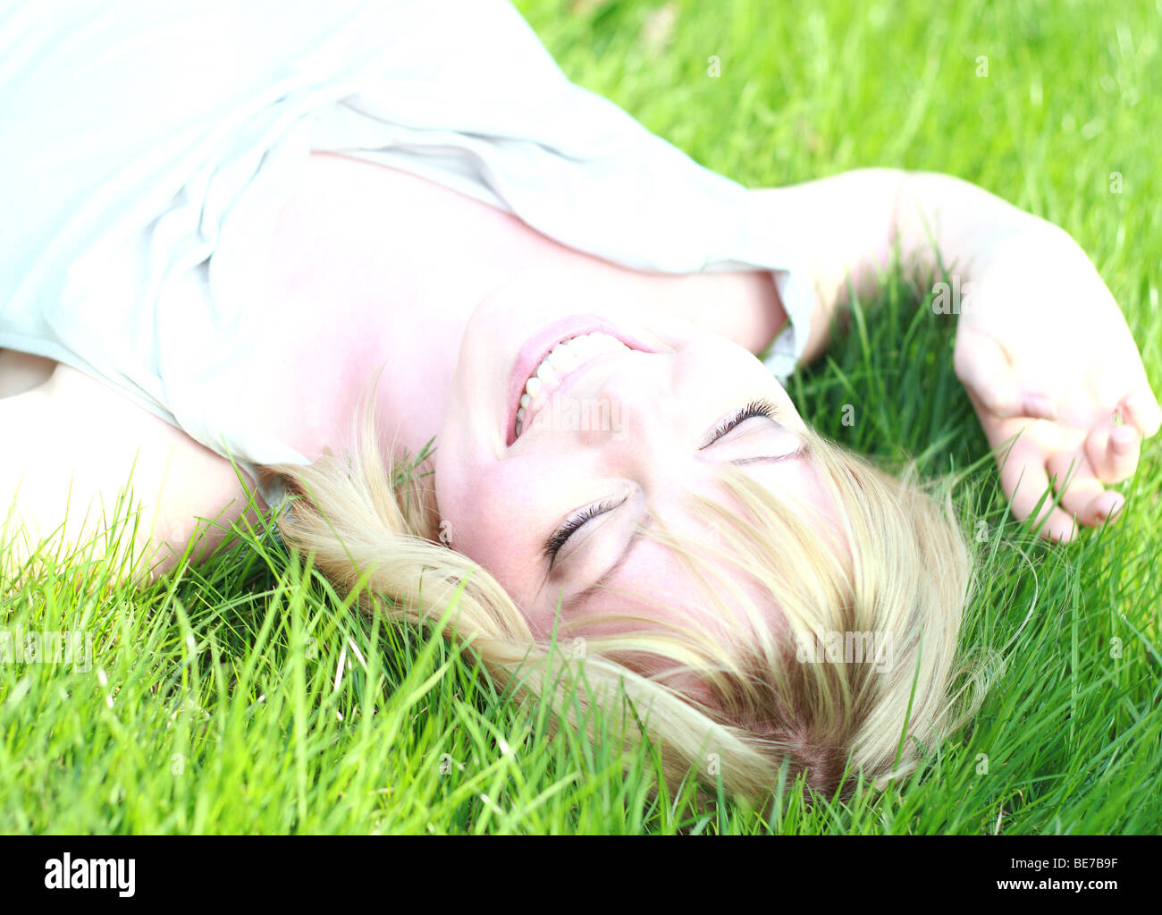 Portrait of pretty relaxing woman outdoor Stock Photo - Alamy