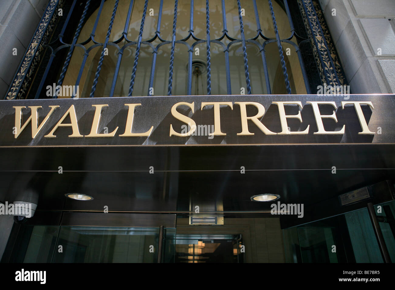 Wall street sign in the financial district area of downtown Manhattan ...