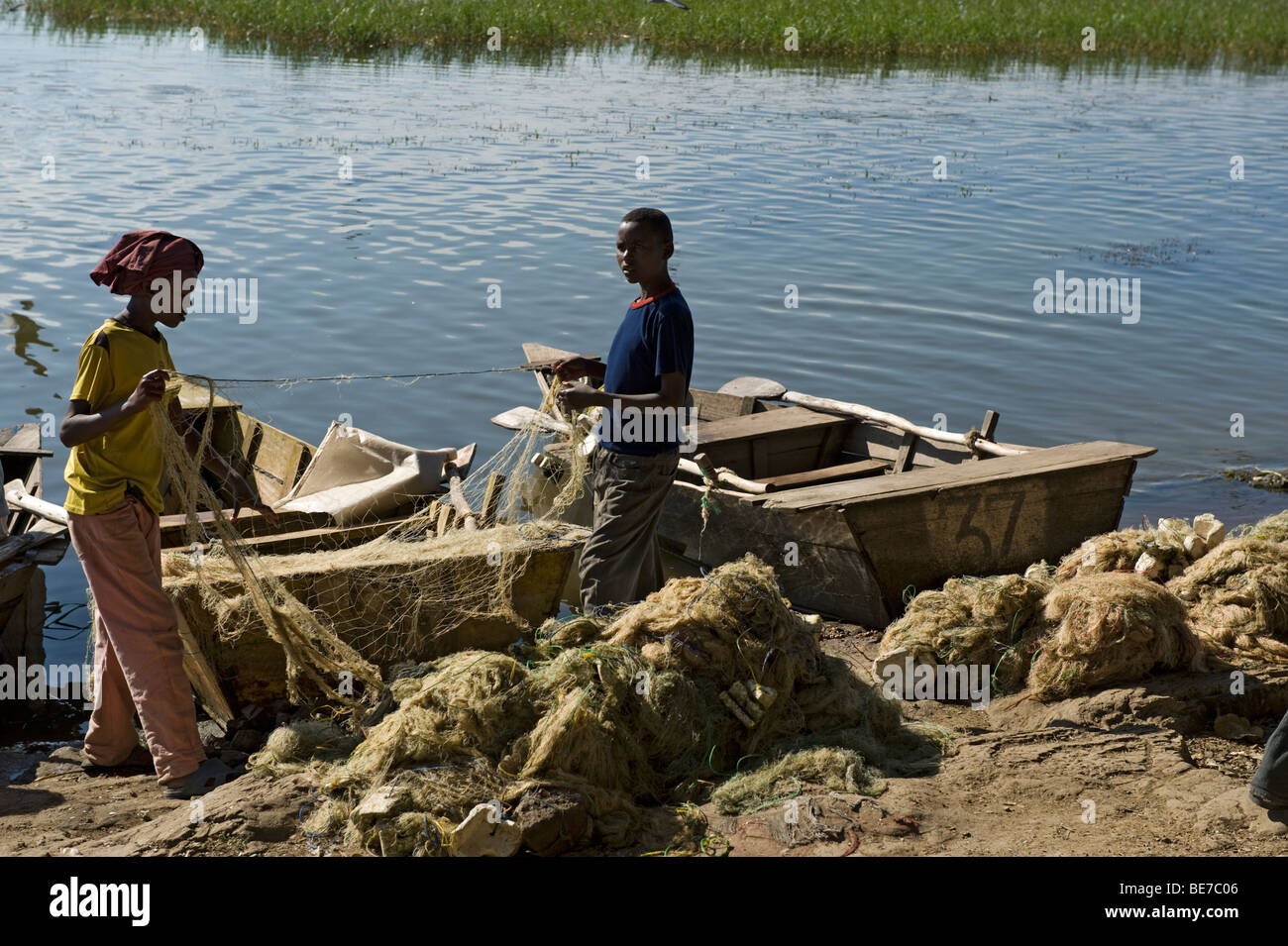 boys with fishing nets, Fish market, lake Awassa, Ethiopia Stock Photo ...