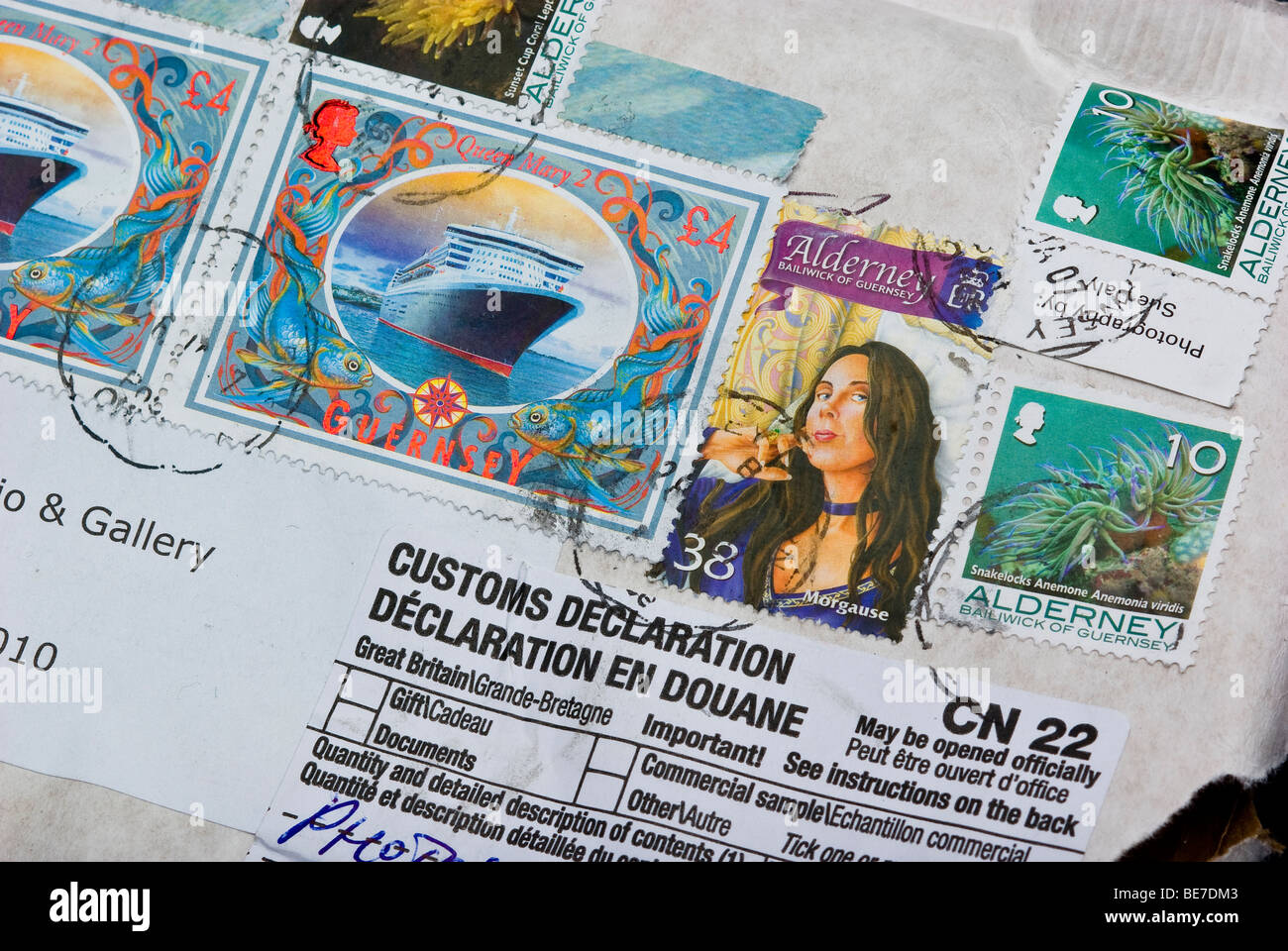 Envelope with colorful stamps from Guernsey and showing customs ...