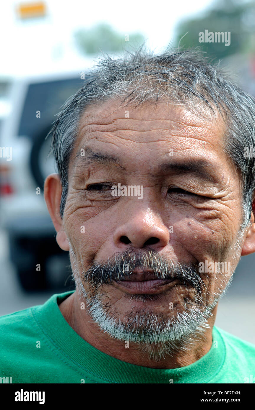 man at bus station tagbilaran bohol philippines Stock Photo - Alamy