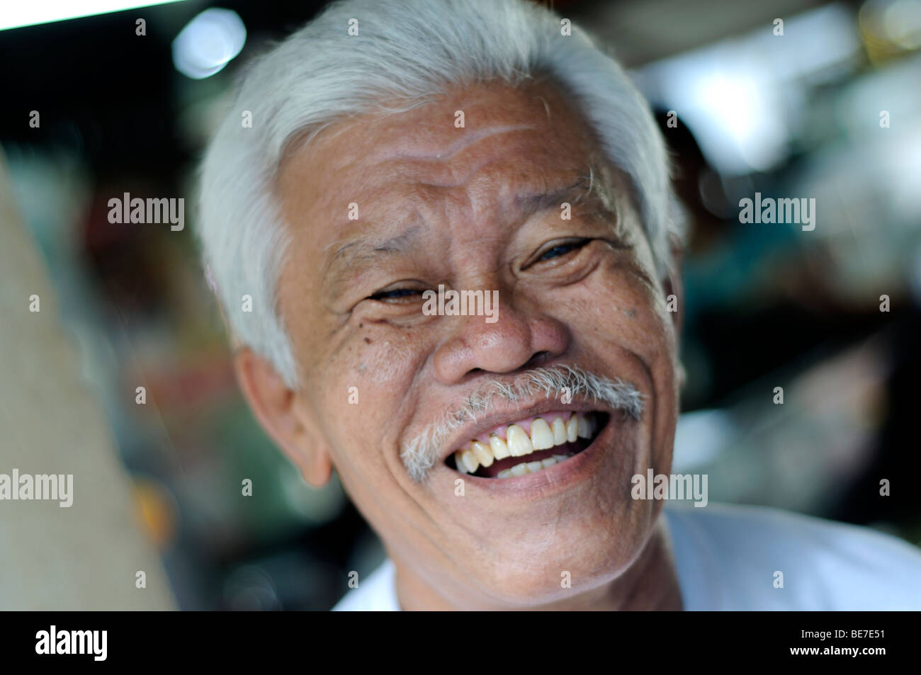 man at bus station tagbilaran bohol philippines Stock Photo - Alamy