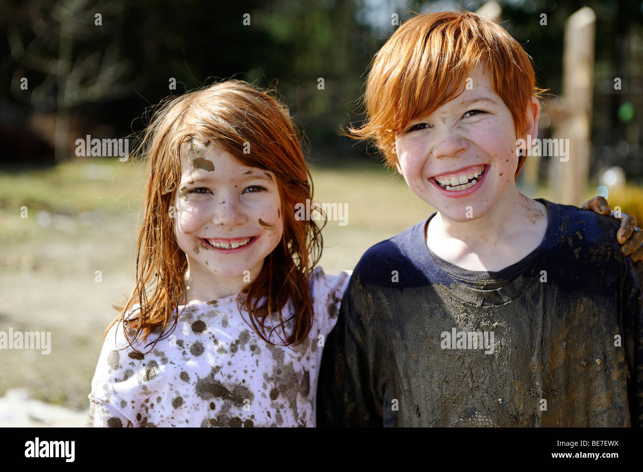 Children, totally covered in mud, dirty, wild, untypical girl Stock ...