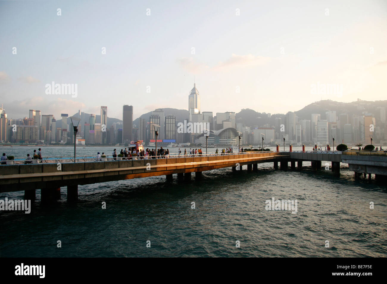 Pier of Kowloon, Tsim Sha Tsui shore, the skyline of Hong Kong Island ...