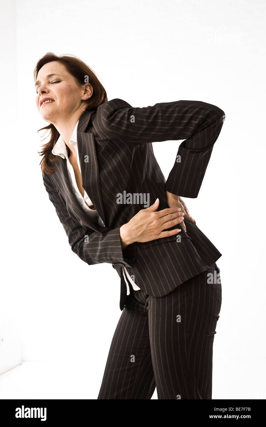 Woman and back pain and clothes hi-res stock photography and images - Alamy