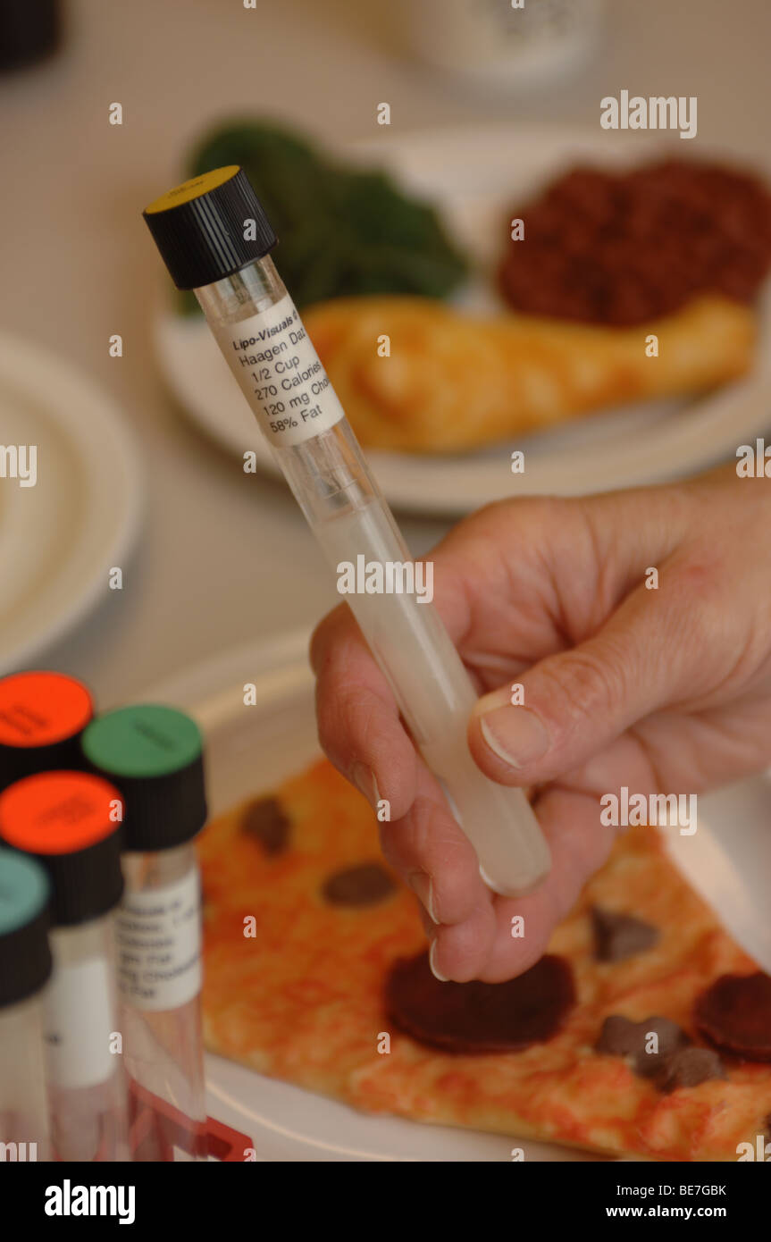 Test tube with fat content of pizza Stock Photo - Alamy