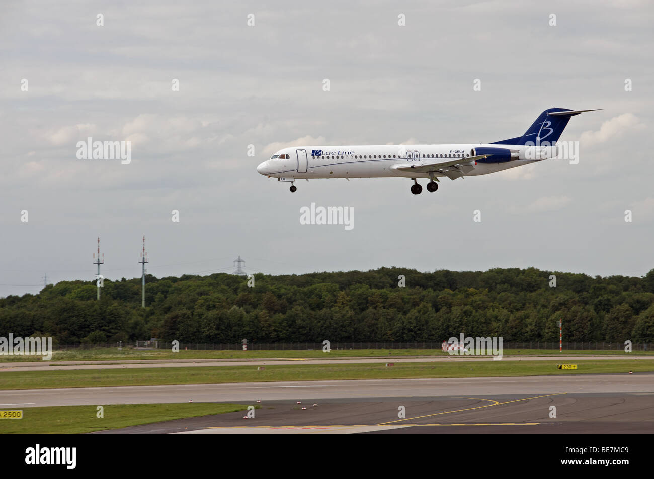 Blue Line Airways Fokker 100 passenger aircraft coming into land ...
