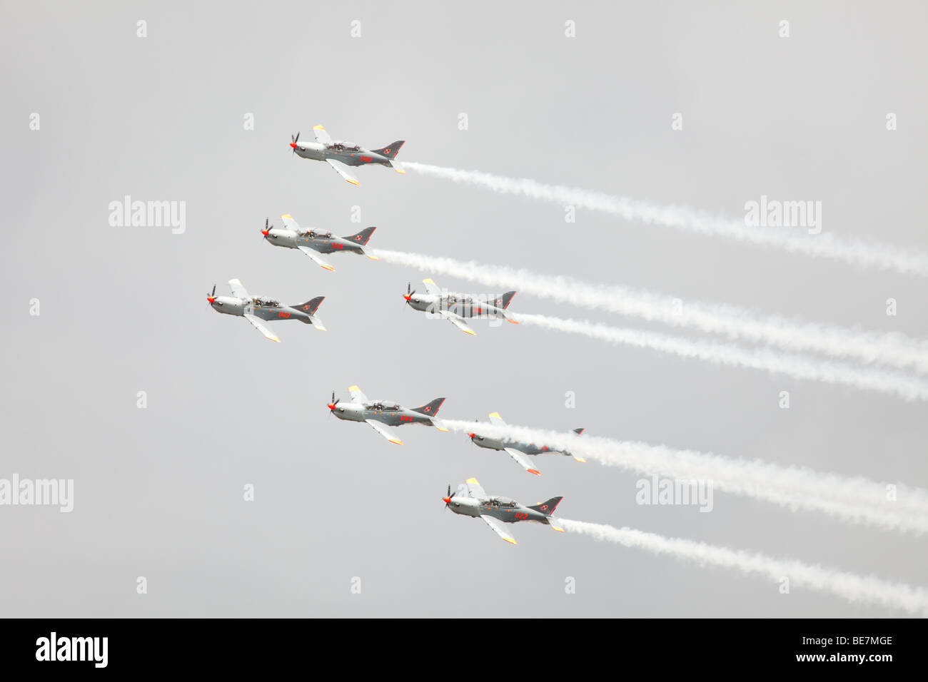 Airplanes performing aerobatic stunt at airshow Stock Photo - Alamy