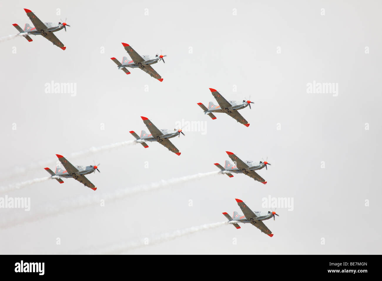 Airplanes performing aerobatic stunt at airshow Stock Photo - Alamy