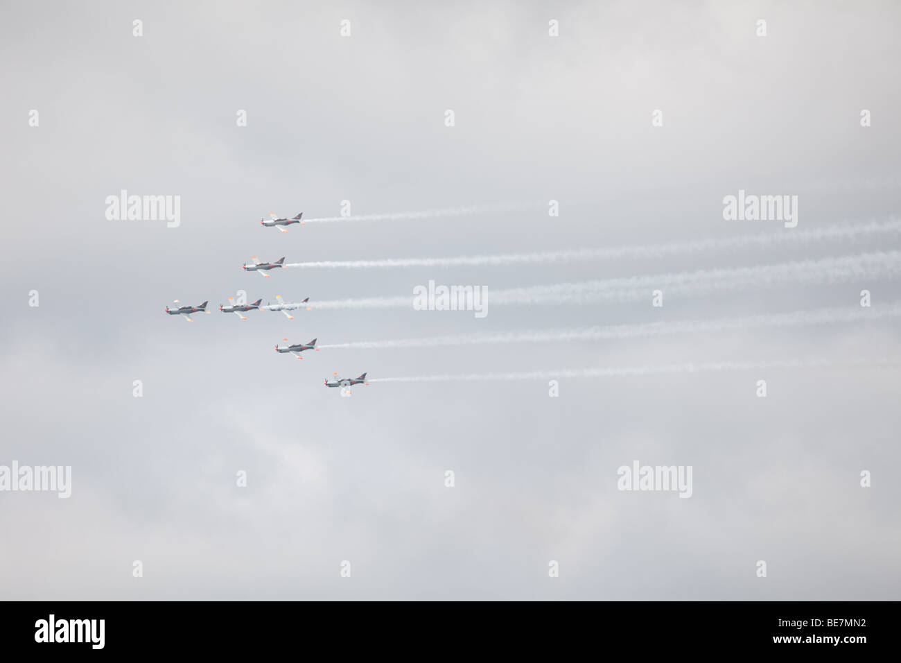 Airplanes performing aerobatic stunt at airshow Stock Photo - Alamy
