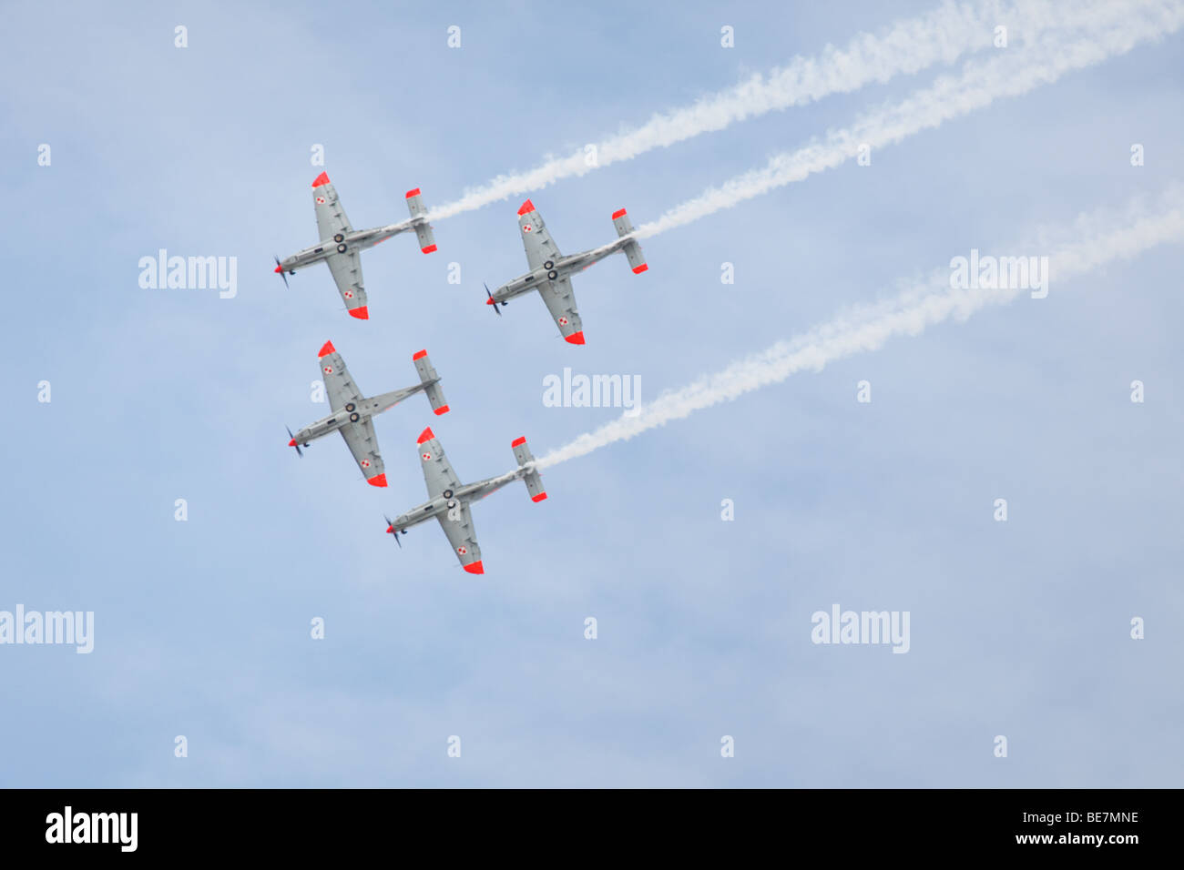 Airplanes performing aerobatic stunt at airshow Stock Photo - Alamy
