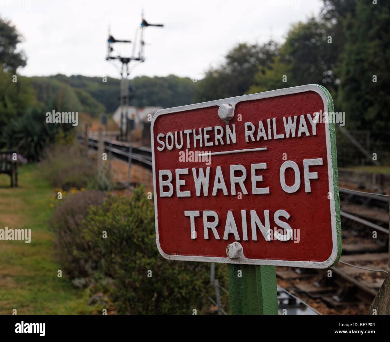 Beware of trains rail railway line sign signs hi-res stock photography ...