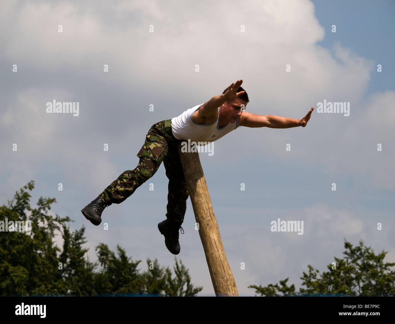 Balancing on top of pole hi-res stock photography and images - Alamy