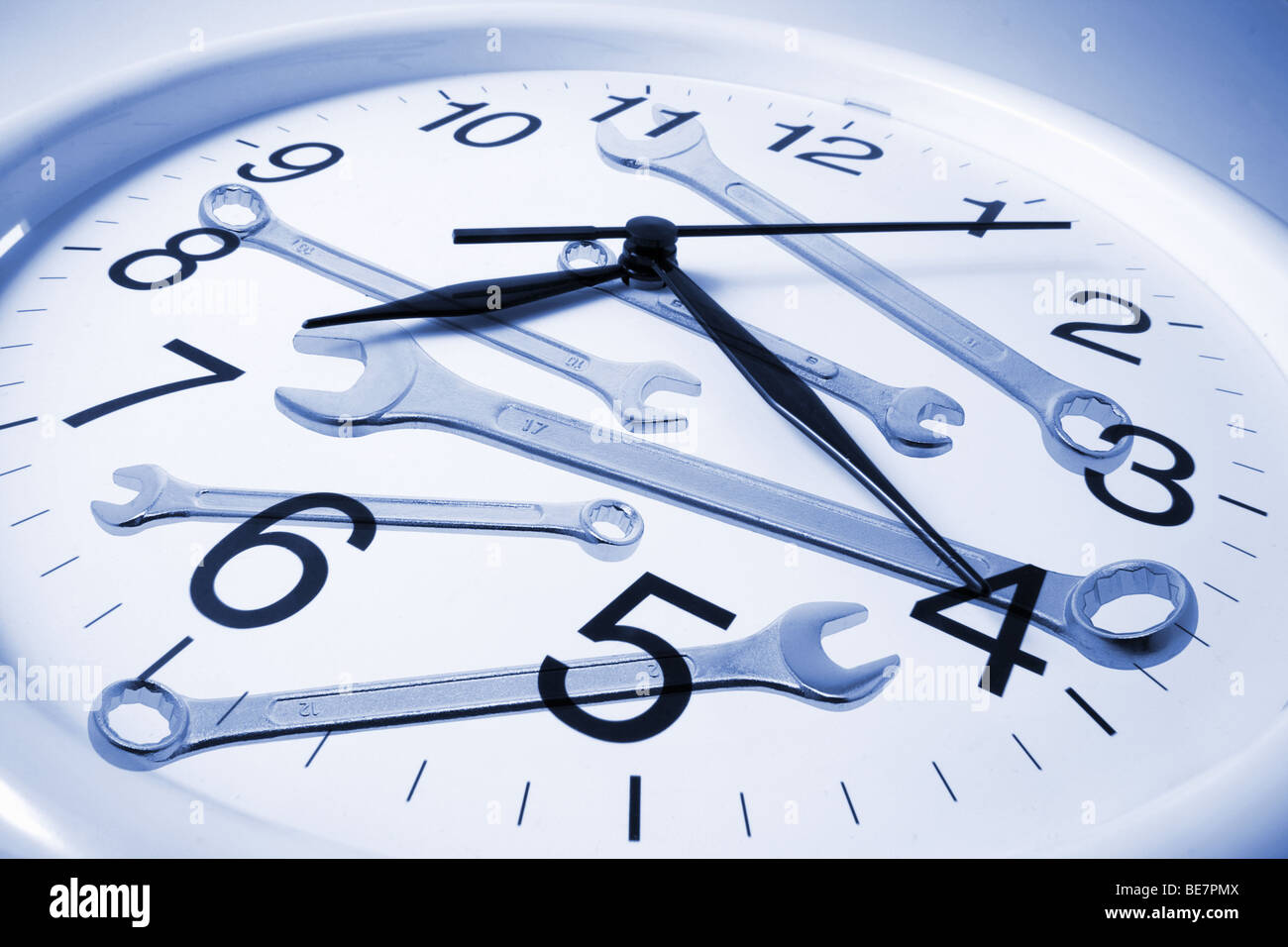 Clock and Spanners Stock Photo - Alamy