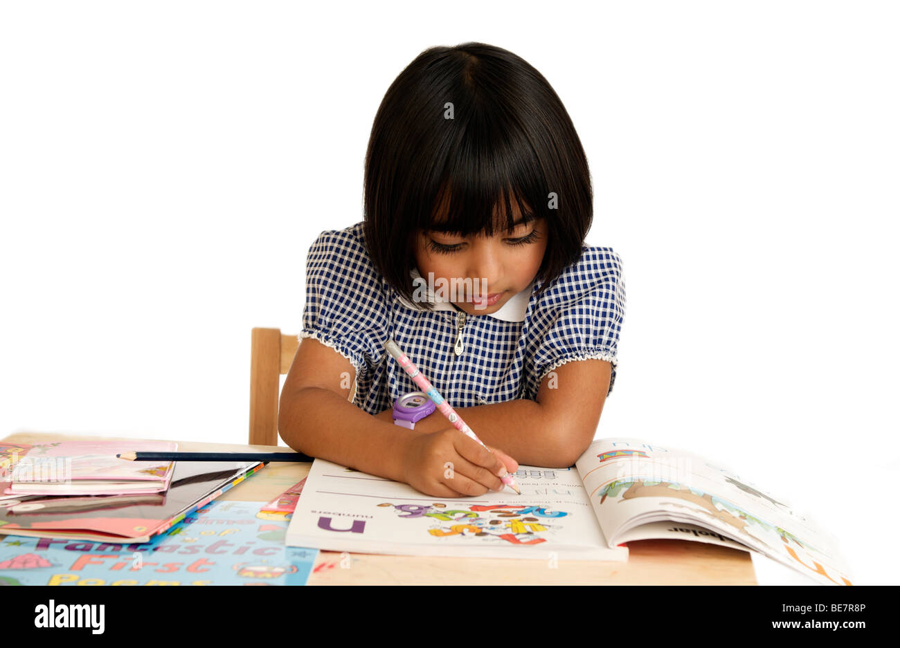 A little girl studying Stock Photo - Alamy