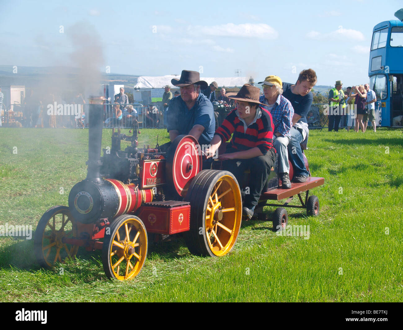 People having a ride on a working scale model of a steam engine Stock ...