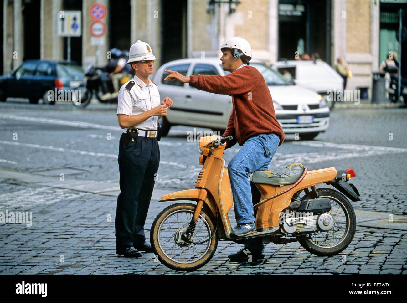 Traffic policeman, moped riders, Piazza Venezia, Rome, Lazio, Italy ...