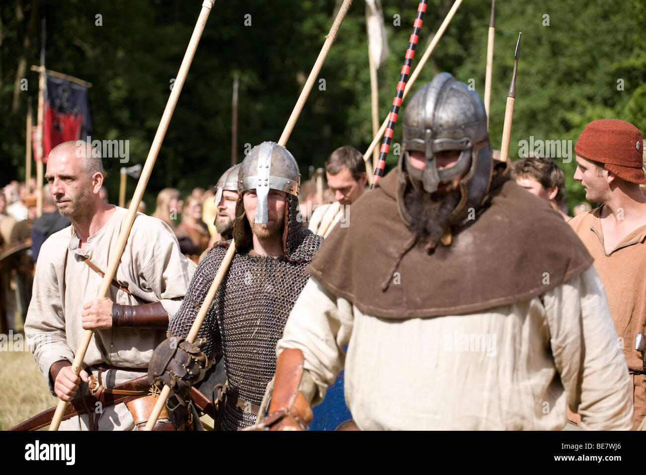 Viking warriors returning from battle at a viking re-enactment festival ...