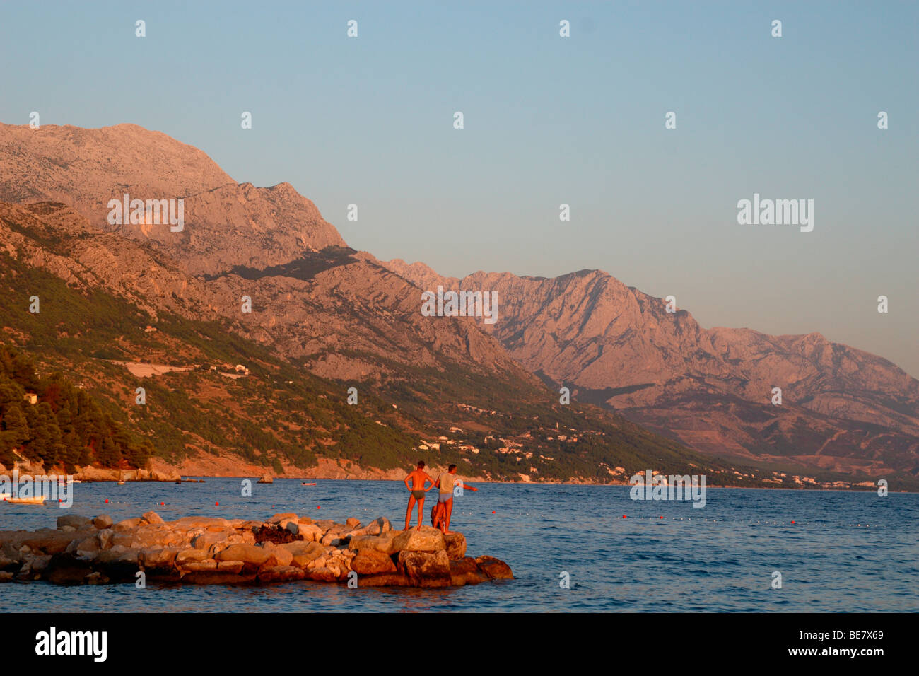 People on the Pisak Beach at sunset in Croatia Stock Photo - Alamy