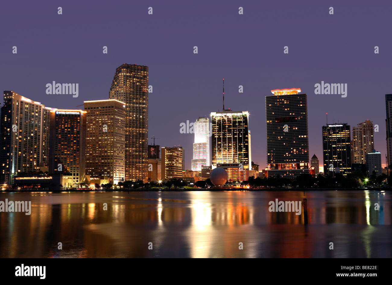 The illuminated high rise buildings at downtown at night, Miami ...