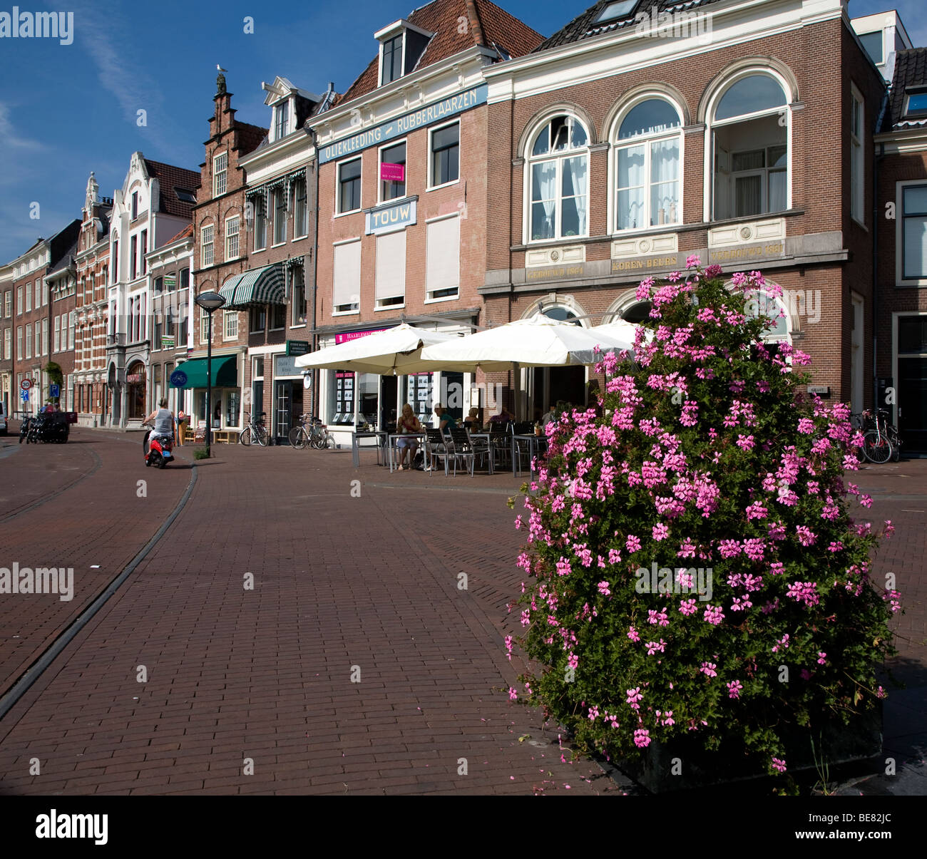 People sitting outside cafe Haarlem Holland Stock Photo - Alamy