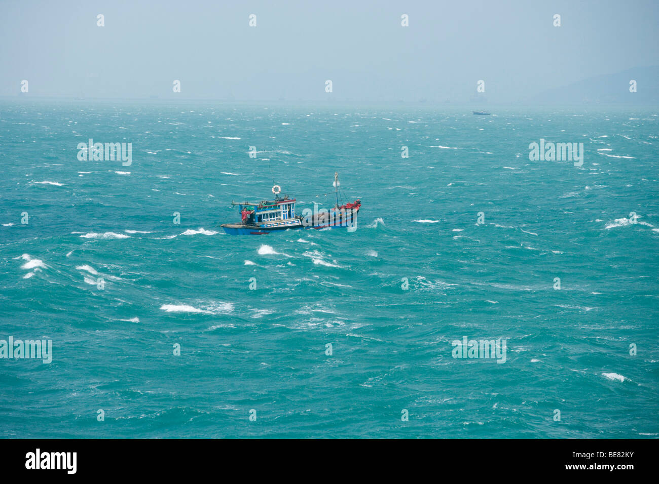 Fishing boat in a rough and choppy sea, Near Nha Trang, Khanh Hoa ...