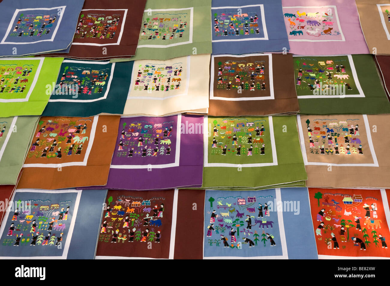 Colourful embroidered pillow cases on display at a market stall in ...