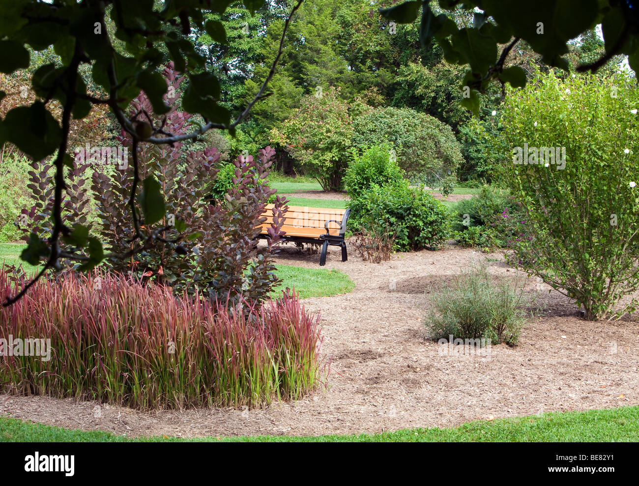 A garden park bench Stock Photo - Alamy