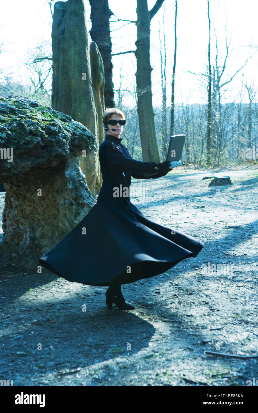 Woman looking over shoulder full body hi-res stock photography and ...