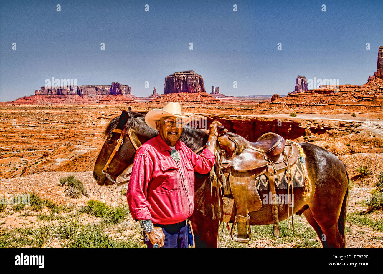 Monument Valley Utah with mittens and great Cherokee Indian on horse as ...