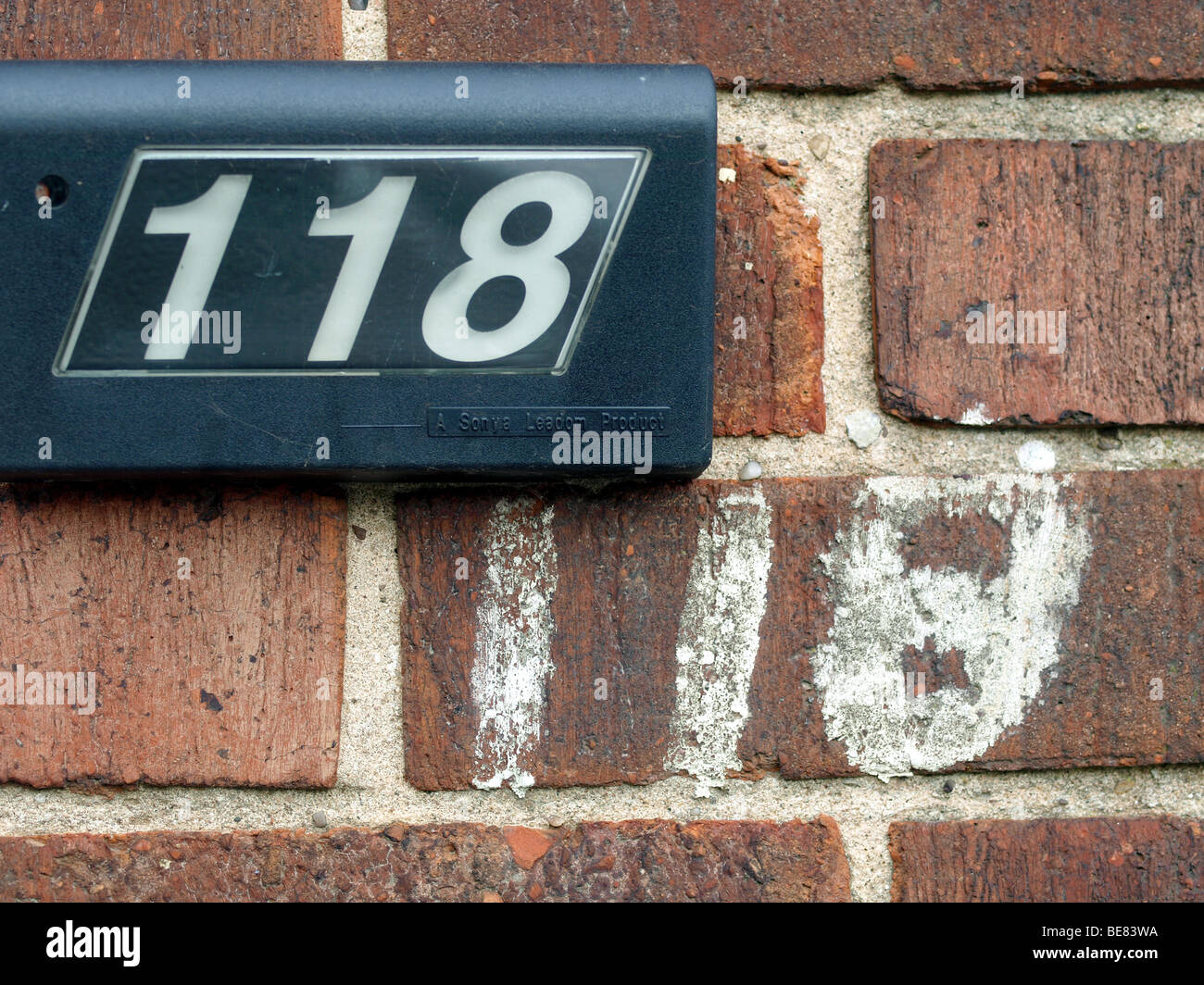 Door number duplicated,reading 118-118 Stock Photo - Alamy
