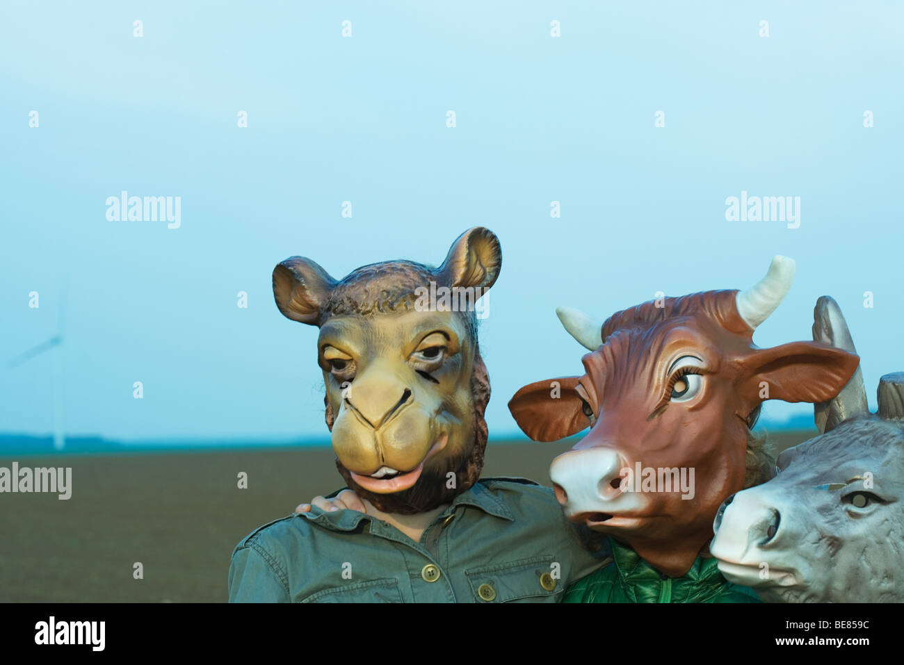 Three people wearing animal masks together Stock Photo - Alamy