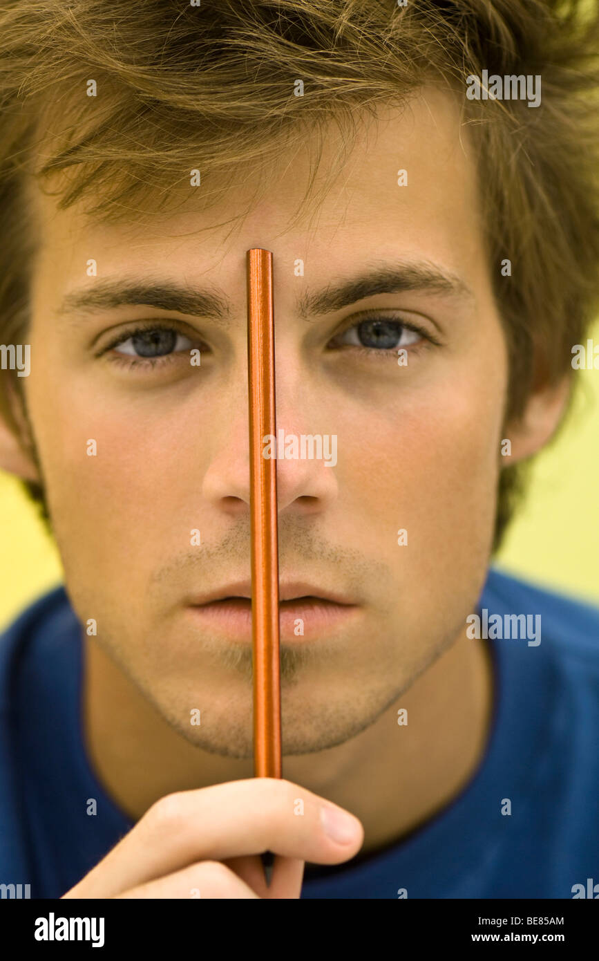 Man with pencil hi-res stock photography and images - Alamy