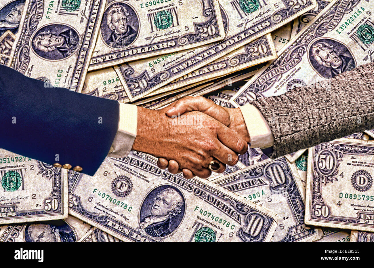 US Paper Currency and Men Shaking Hands Making Deal Stock Photo - Alamy