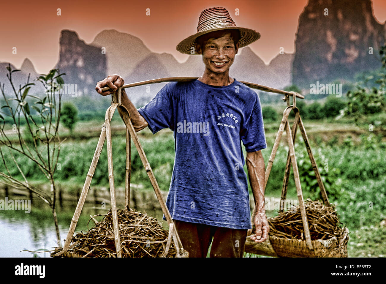 Colorful portrait of rice farmer in Yangshou China Stock Photo - Alamy