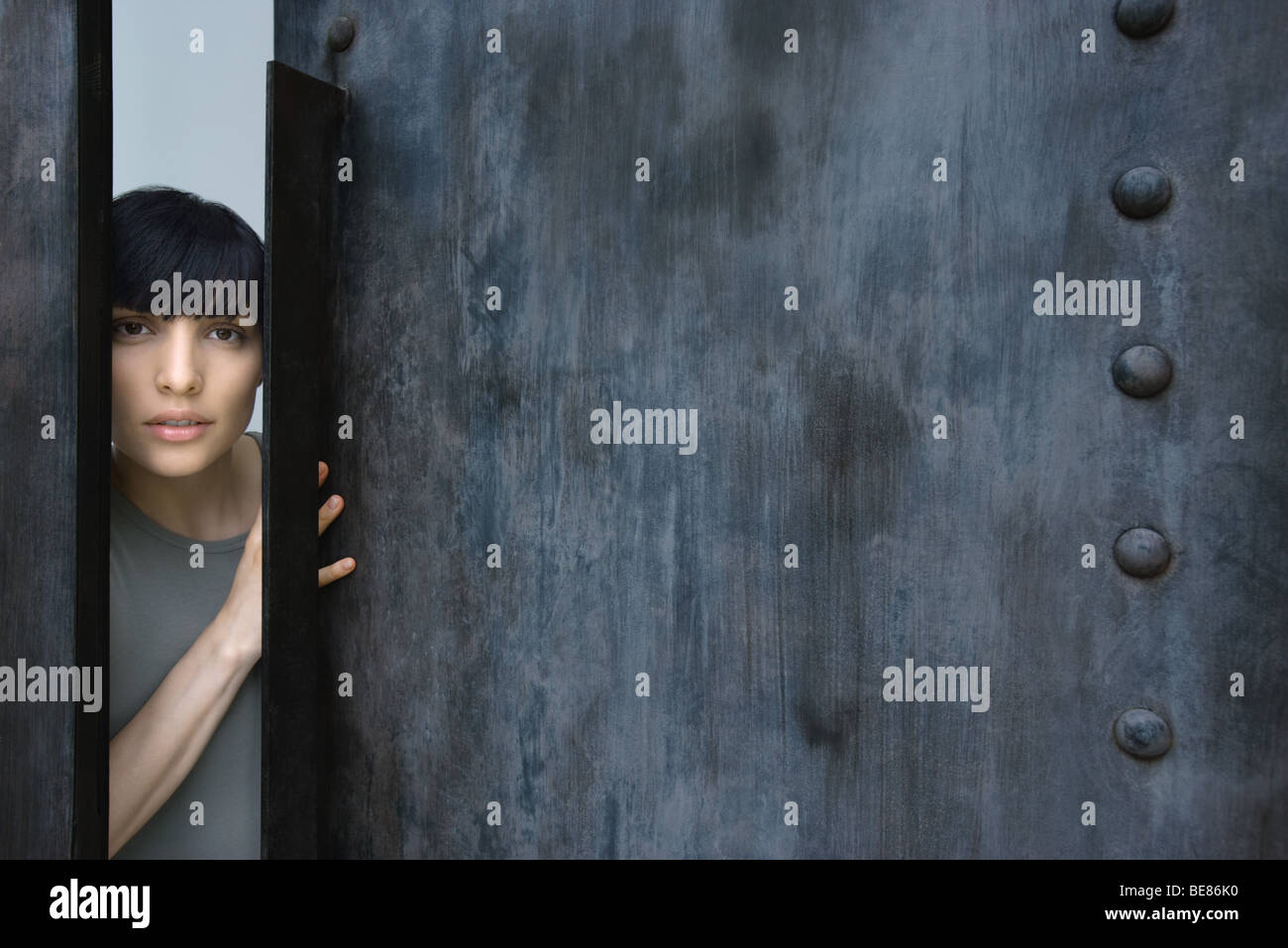 Woman at half door hi-res stock photography and images - Alamy