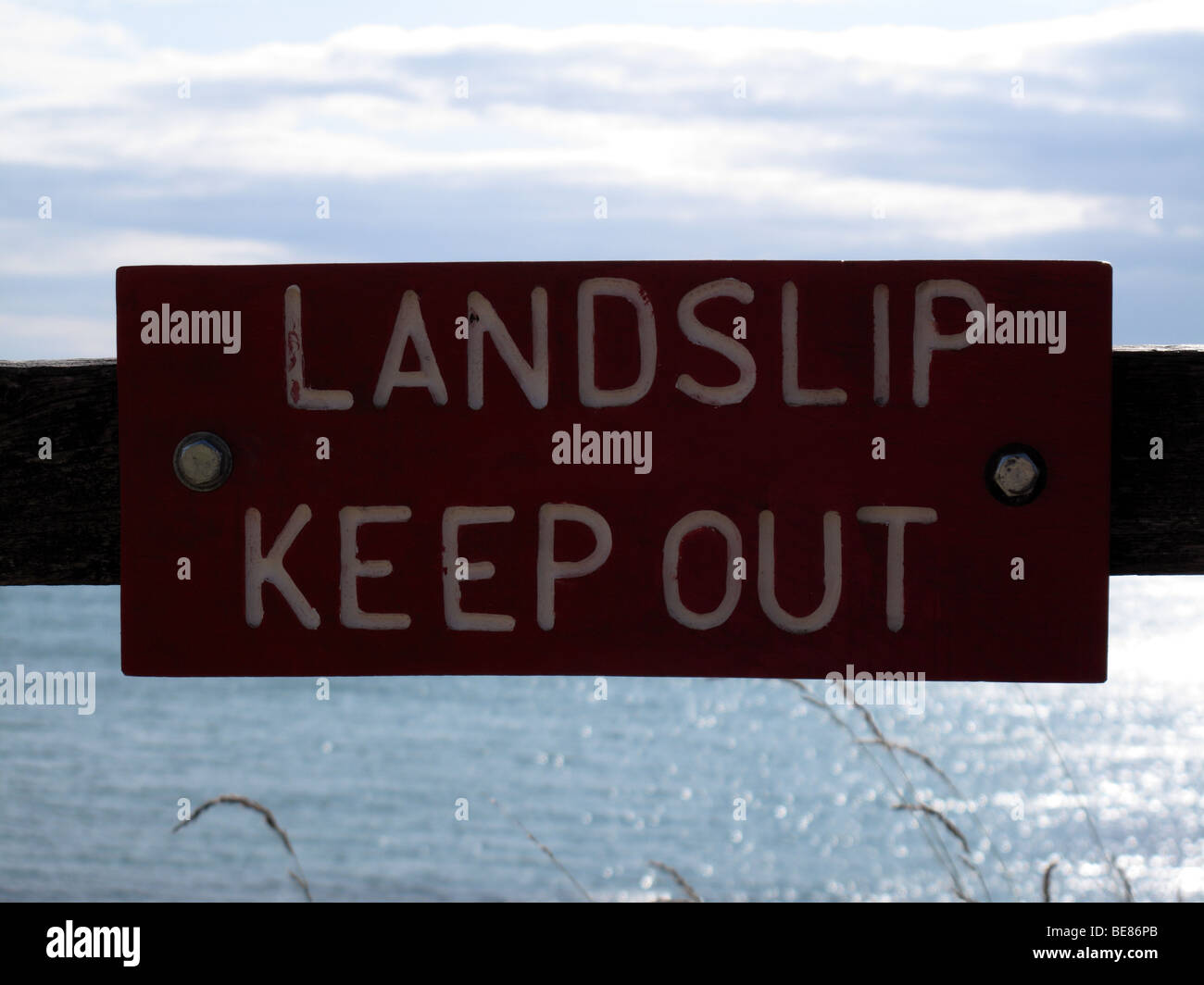 Landslip warning sigh Stock Photo - Alamy