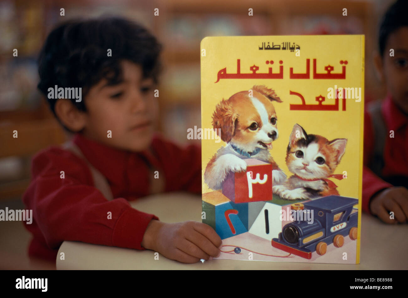 KUWAIT Middle East Gulf State Education Young boy in school library ...