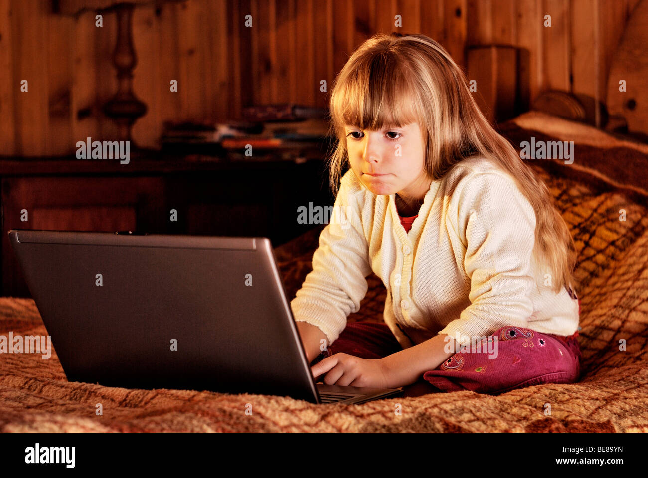 Girl and computer Stock Photo - Alamy