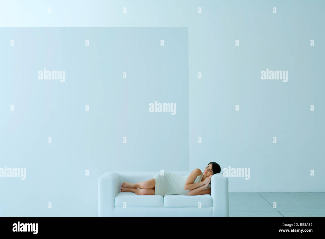 Woman in white clothes rests hi-res stock photography and images - Alamy