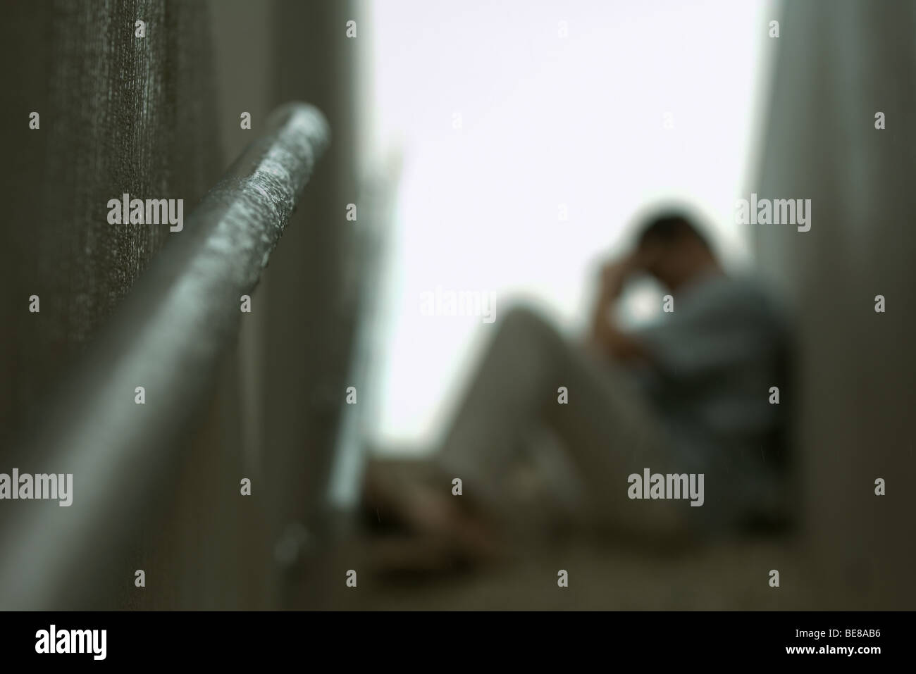 People sitting on steps below hi-res stock photography and images - Alamy