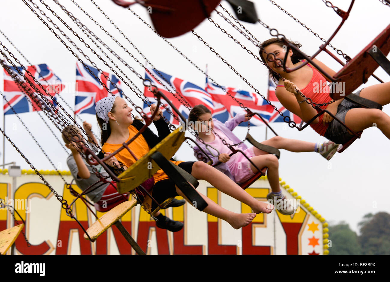 England West Sussex Findon Village Sheep Fair Children in motion riding ...
