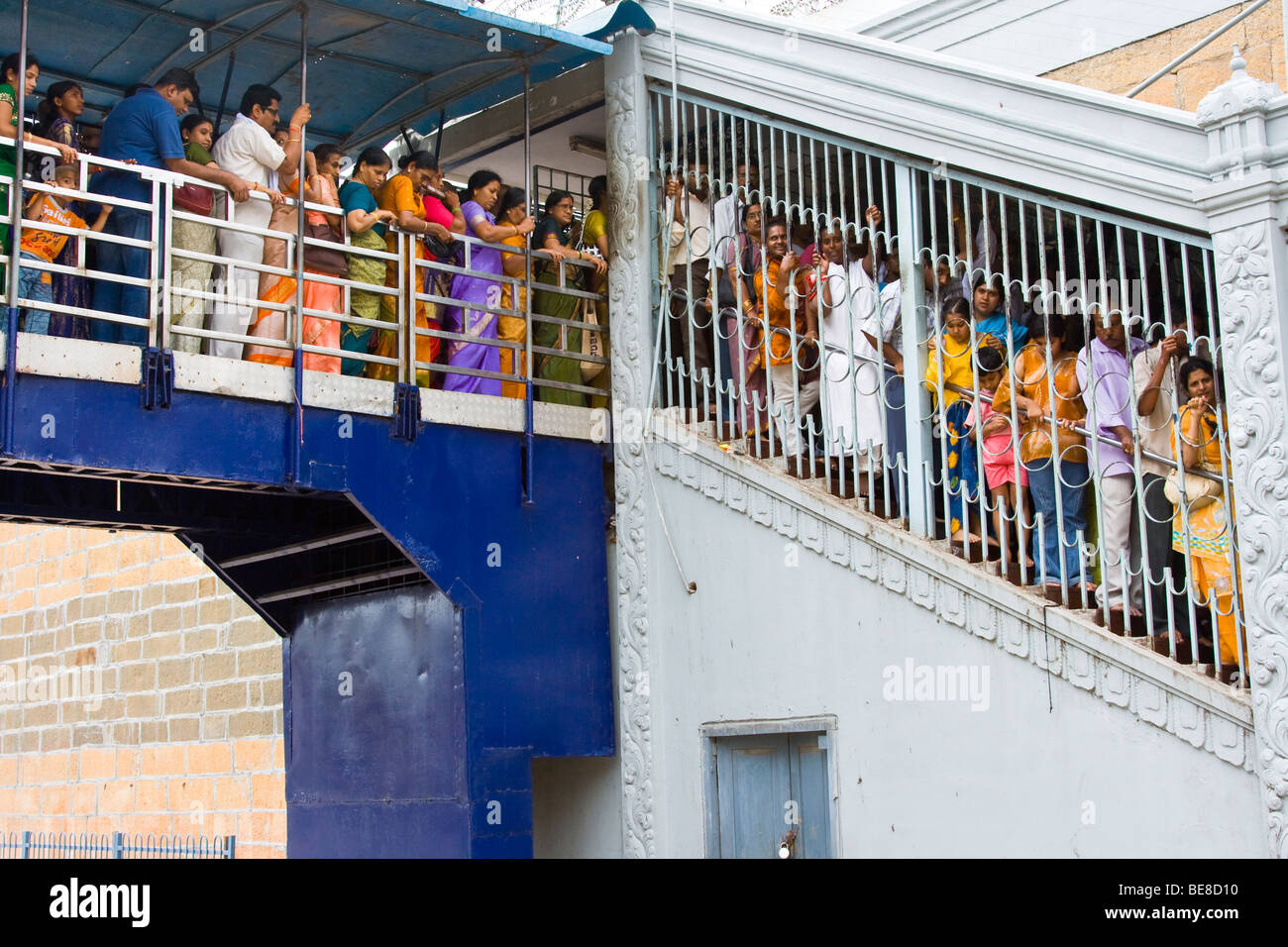 Hindu pilgrims waiting for hours in line to see the idol at Sri ...