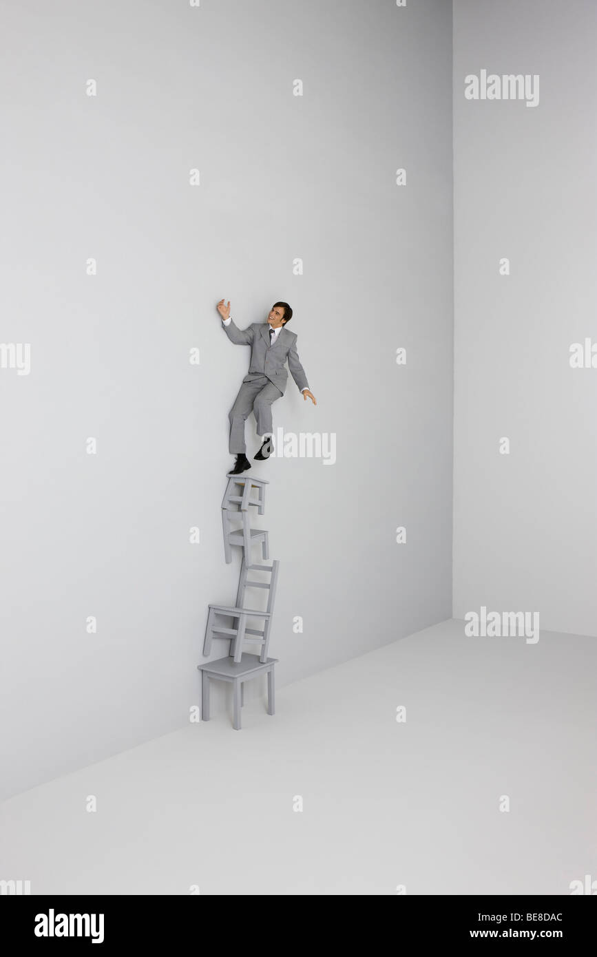 Precarious ladder hi-res stock photography and images - Alamy