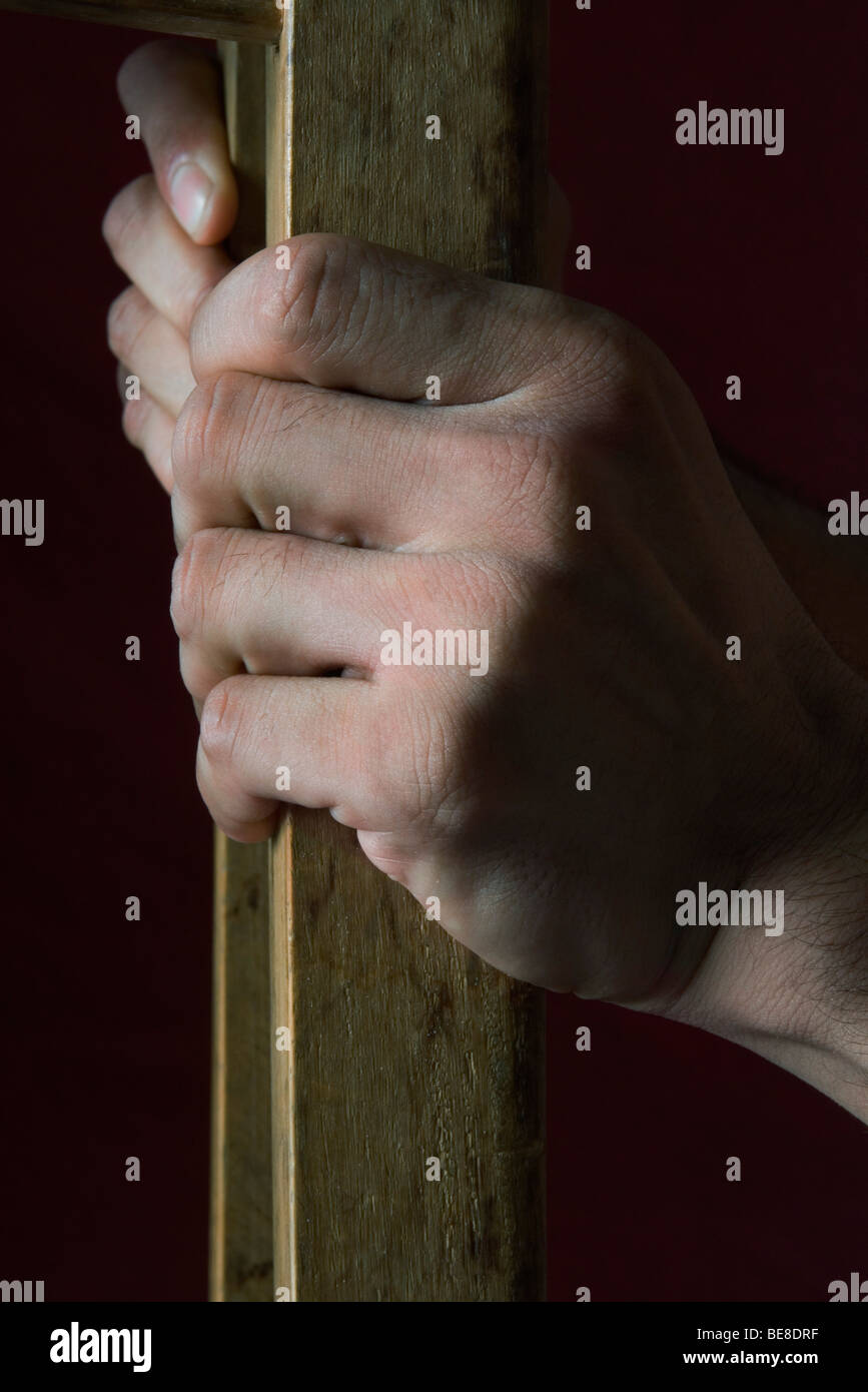 Hands holding piece of wood Stock Photo - Alamy