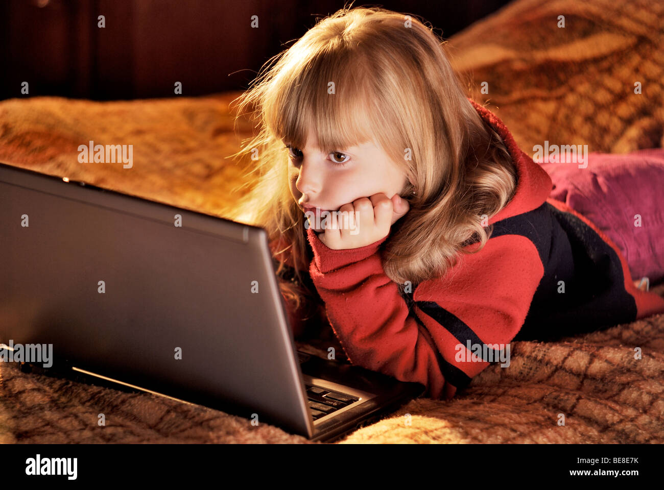 Girl and computer Stock Photo - Alamy