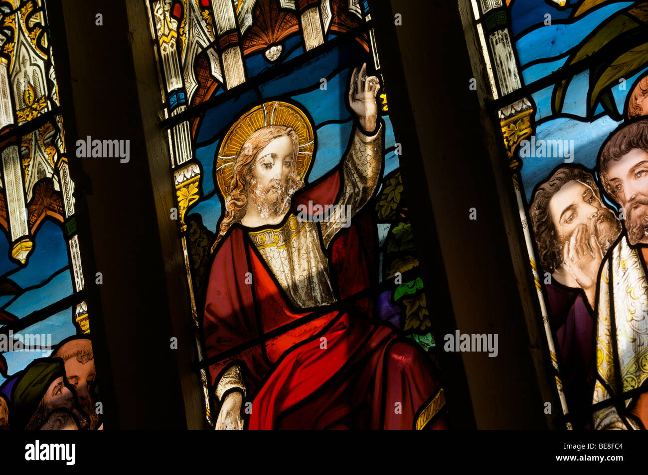 Stained glass depictions of Jesus Christ in an English church Stock ...